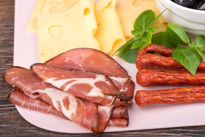 Close-up of Cuts of Dry-cured Pork Neck and Cheese. Stock Image - Image ...