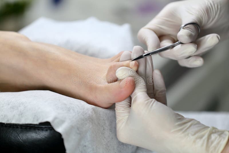 Close Up Cutting Cuticle on Foot, Nail Scissors Stock Photo - Image of ...