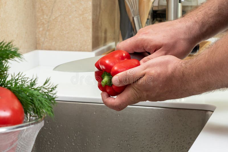 Close-up of Cutting a Sweet Red Pepper To Remove the Seeds Stock Image ...