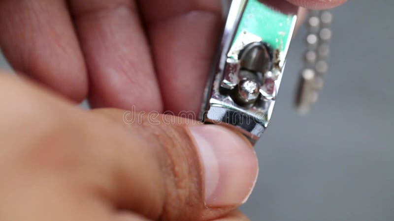 Close Up Cutting Thumb Nails Using Nail Clippers Stock Footage - Video ...