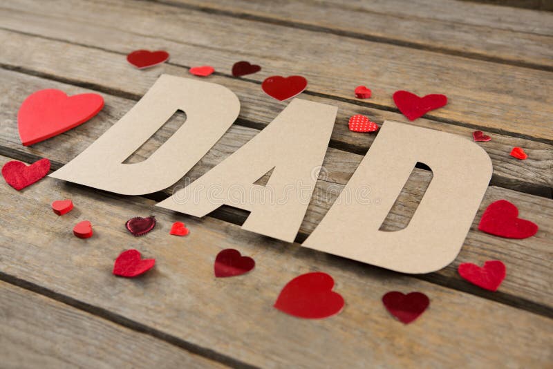 Close Up of Dad Text with Heart Shapes on Table Stock Photo - Image of ...