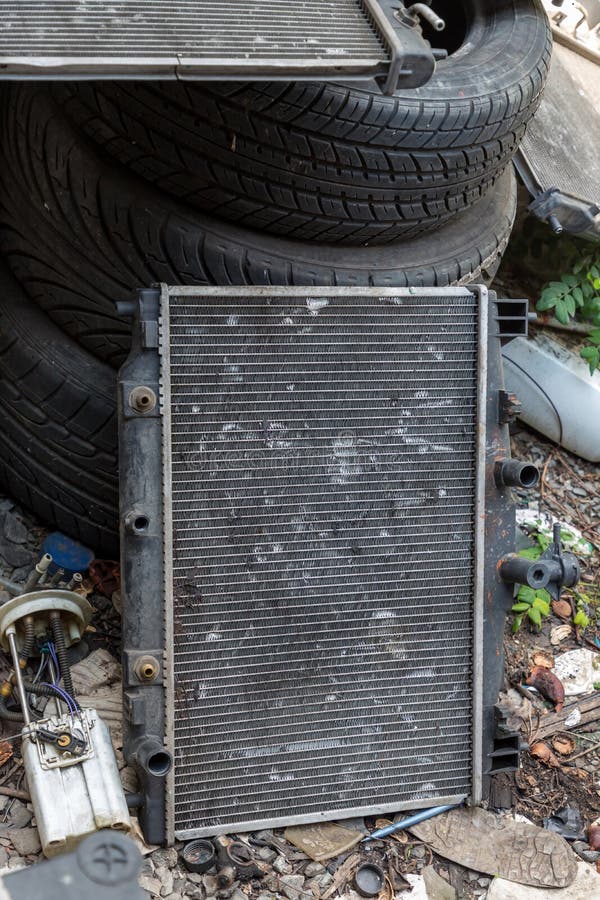 The Damage of Car Cooling Radiator. the Old Radiator of the Damaged Car ...