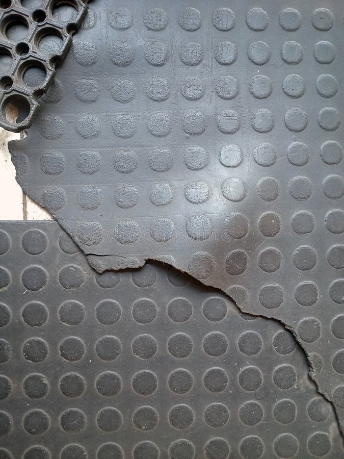 Close Up of Damaged Black Rubber Flooring Stock Photo - Image of ...