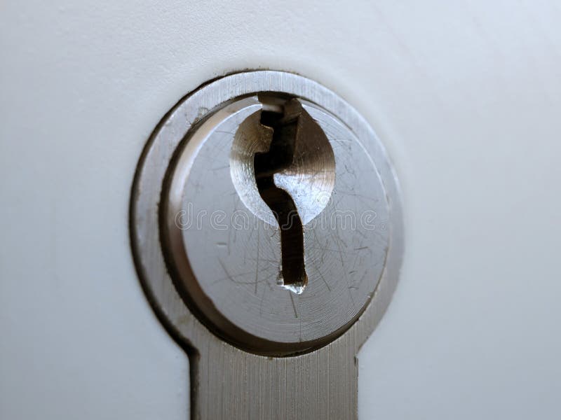 Close-up of a Damaged Cylinder Lock and Scratches on Metal Surface ...