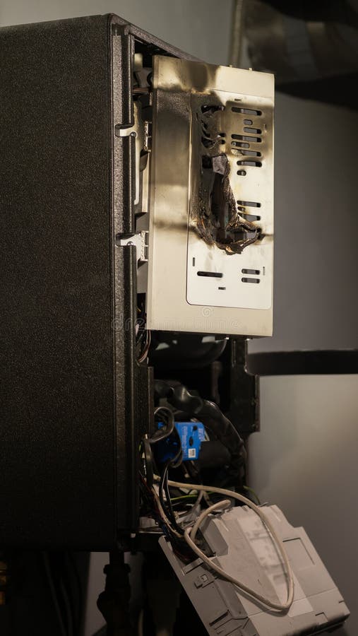 Damaged Electric Boiler Panel with Burn Marks and Melted Components ...