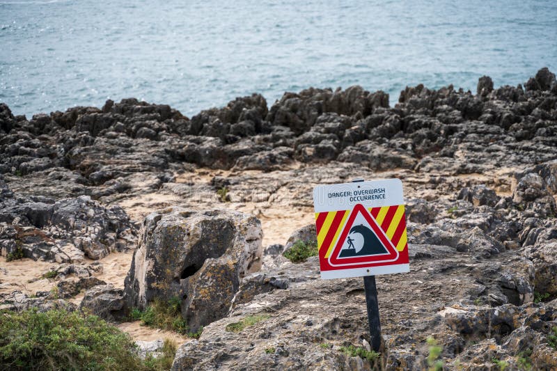 Close Up of a Danger Sign, Overwash Danger, Unstable Cliffs Keep Clear ...