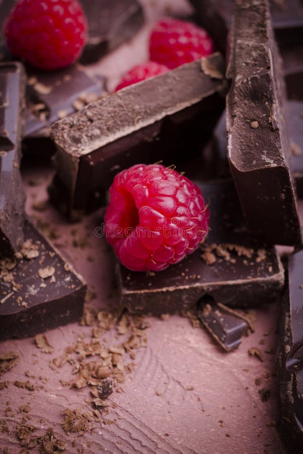 Close Up of Dark Chocolate Bar with Fresh Raspberry. Stock Image ...