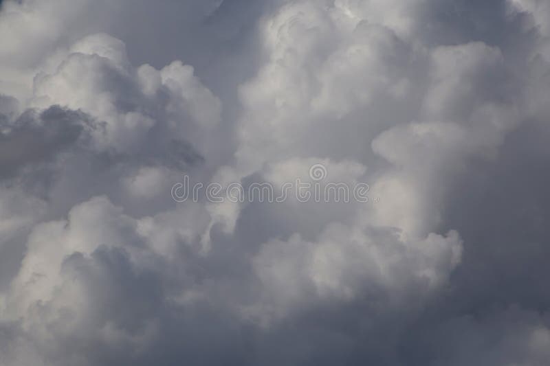 Close Up of Dark and Light Fluffy Rain Clouds Stock Image - Image of ...