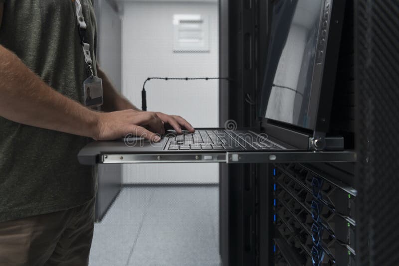 Close Up on Data Center Engineer Hands Using Keyboard on a ...