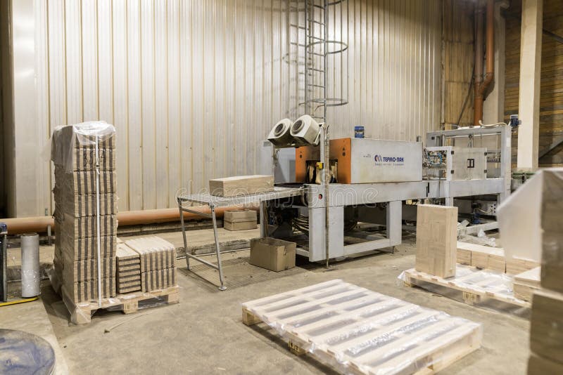The Close Up of Decorative Wooden Blocks in Green Packing Machine Stock ...