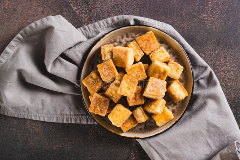 Close Up of Deep Fried Vegetarian Soy Tofu Cheese on Plate on Table Top ...