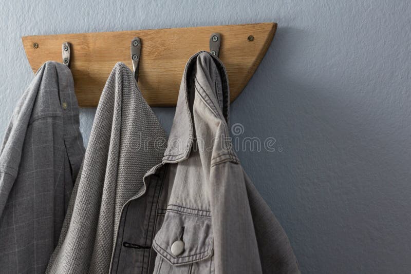 Denim Jacket and Shirt Hanging on Hook Stock Photo - Image of ...
