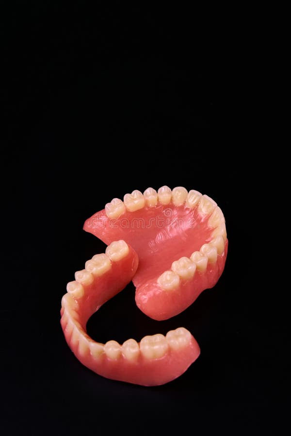 A Close Up of a Denture on a Black Background for Macro Photography ...