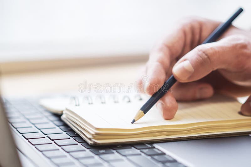 Close-up Depiction of a Man S Hand Taking Notes in a Notepad Stock ...