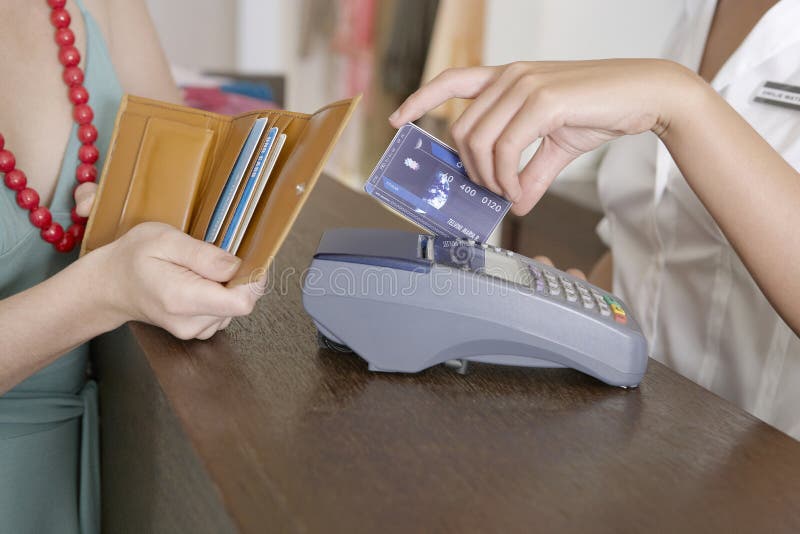 Customer Making Payment Using Credit Card at Bar Stock Image - Image of ...