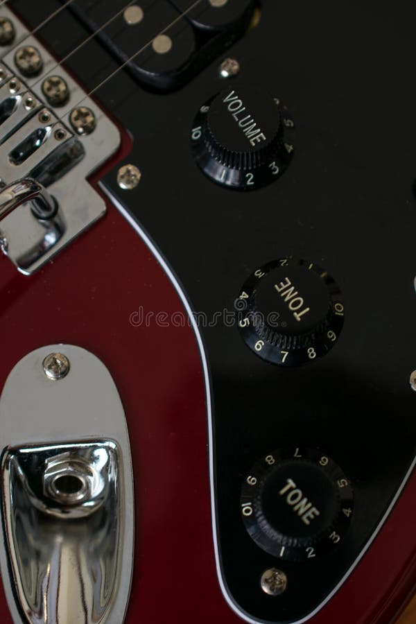 Close-up Detail of the Tone and Volume Knobs of an Electric Guitar ...