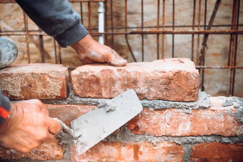 Close Up Details of Industrial Bricklayer Installing Bricks on ...