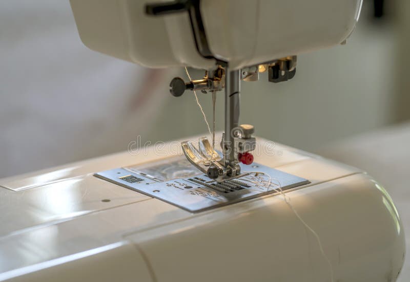 Close-up Details of a Sewing Machine, a Carriage and a Sewing Needle ...