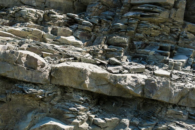 Close-up Diagonal Layered Rock Formation with Large and Small Stones ...