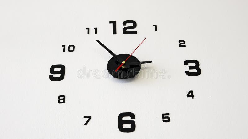 Close-up of a Dial Analog Wall Clock on a White Wall Stock Video ...