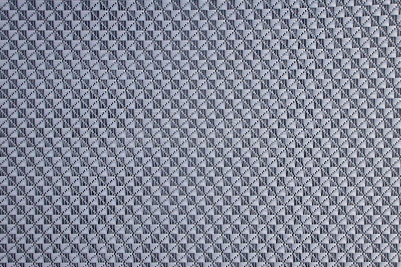 Close-up of Diamond-patterned Textured Synthetic Fabric Used To Make ...