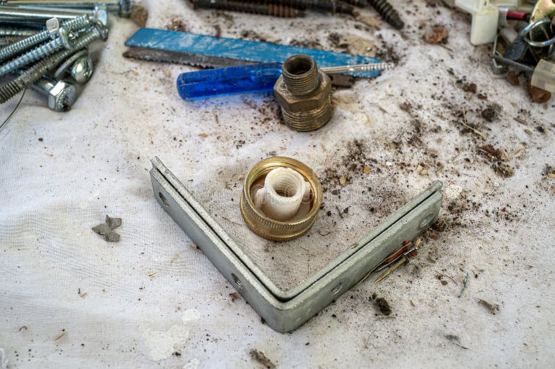 Piles of Bolts Tools Angles and Different Hardware on a Drop Sheet ...
