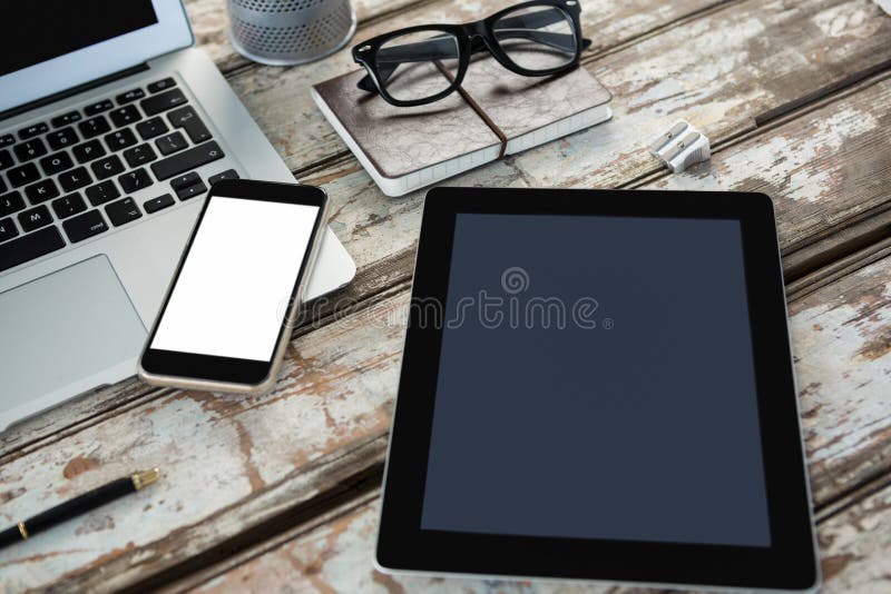 Close-up of Digital Tablet with Mobile Phone and Laptop Stock Photo ...