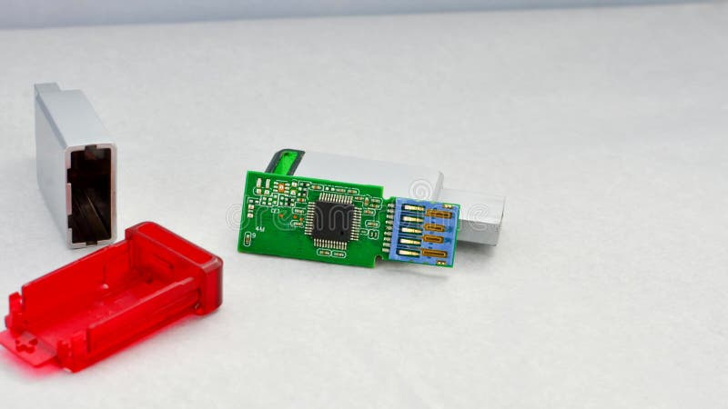Close-up of a Disassembled USB Flash Drive on a White Background ...