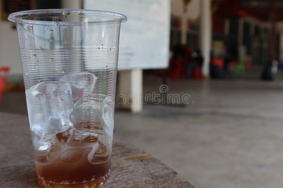 Close-up of a Disposable Plastic Cup with Ice Copy Space Selectable ...