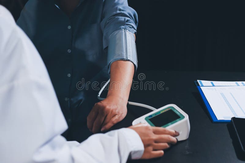 Close-up of Doctor Checking Blood Pressure Stock Image - Image of ...