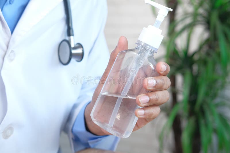 Close Up of Doctor Hand Using Sanitizer Gel Stock Image - Image of hand ...