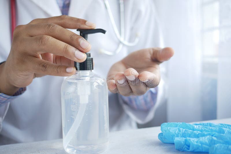Close Up of Doctor Hand Using Sanitizer Gel Stock Photo - Image of wash ...