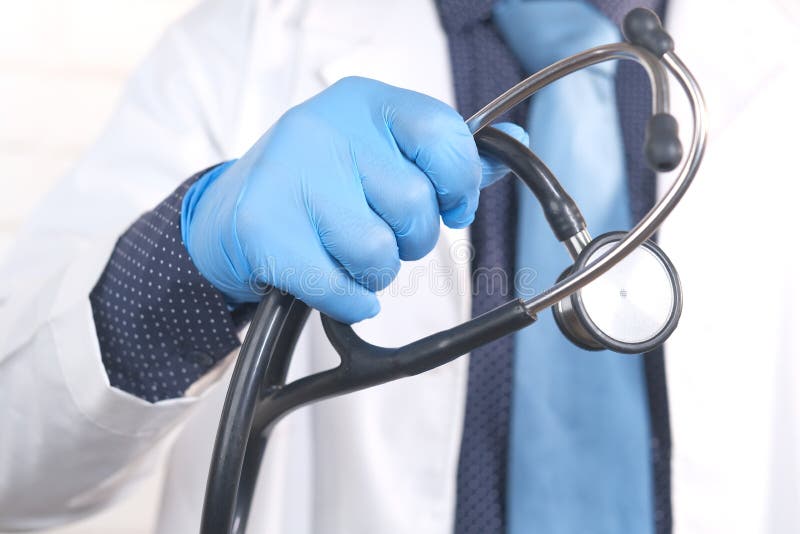 Close Up of Doctor Hand Using Stethoscope. Stock Photo - Image of ...