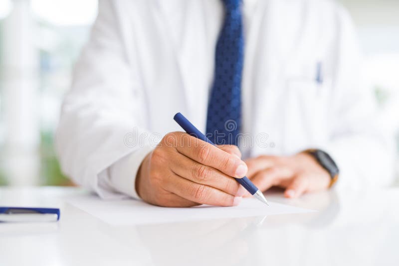 Close Up of Doctor Hands Writing on Paper Stock Photo - Image of ...
