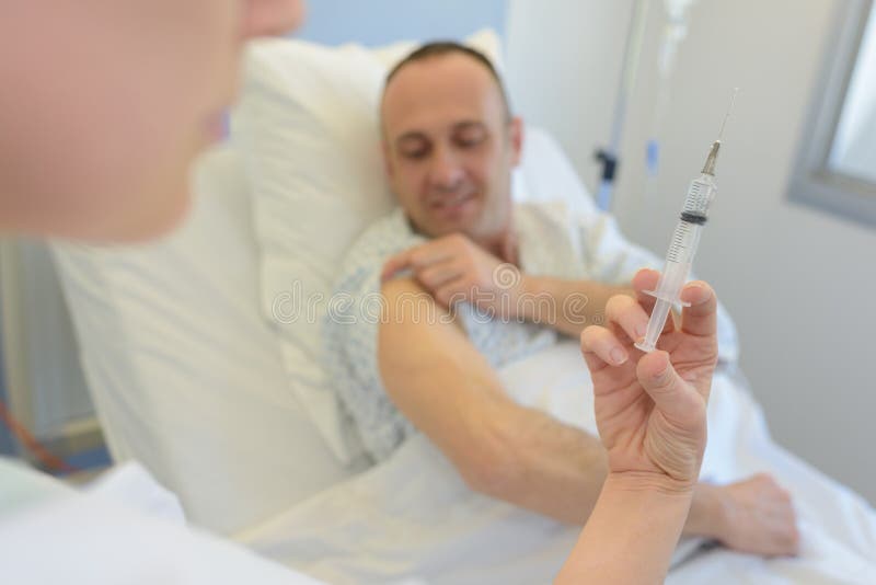 Close-up Doctor Injecting Patient Stock Photo - Image of male, hospital ...