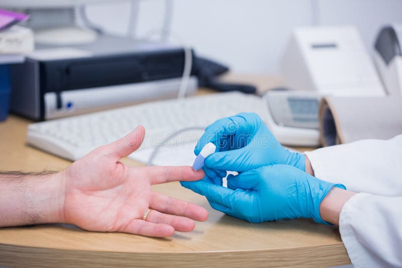 Close Up of a Doctor Testing His Patients Blood Stock Image - Image of ...