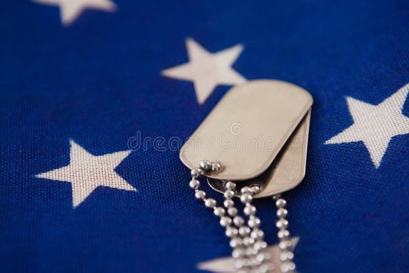 Close-up of Dog Tag on an American Flag Stock Photo - Image of holiday ...