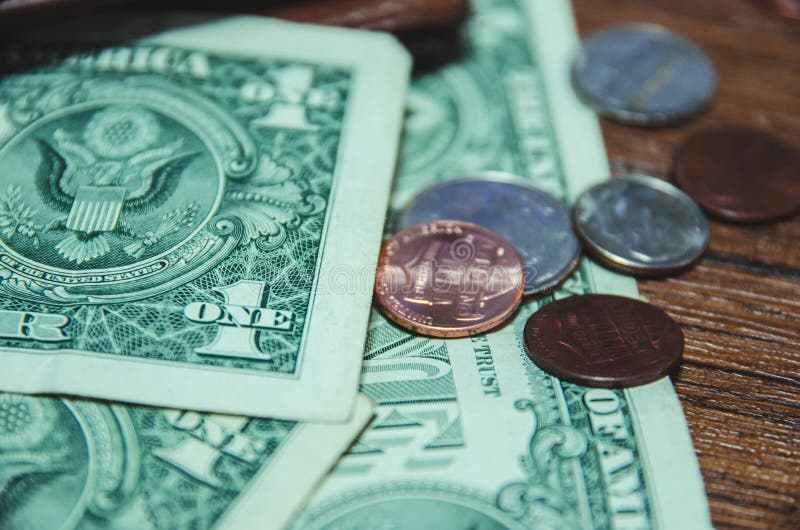 Close Up of Dollar Bill and Coin Stock Image - Image of dark, money ...