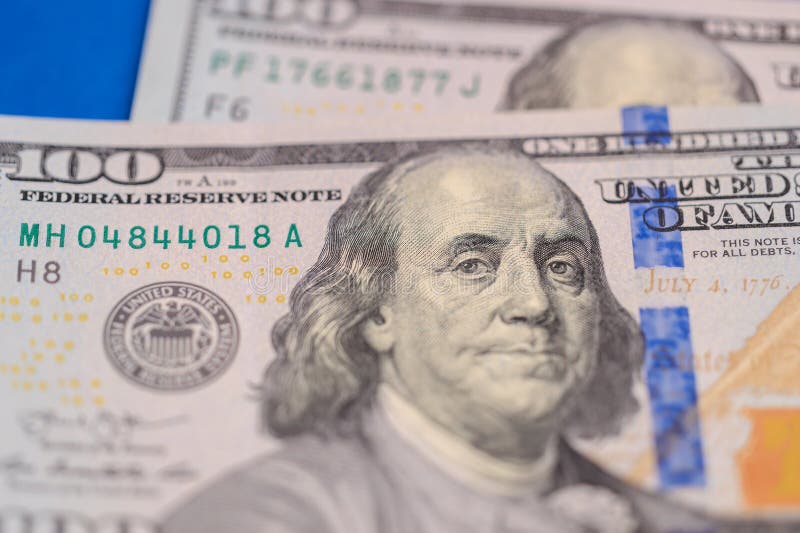 Close-up of 100 Dollar Bill Featuring Benjamin Franklin with Blue ...