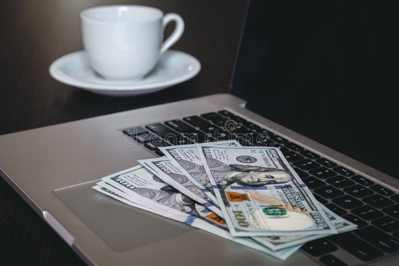 Close-up, Dollar Bills on a Laptop, the Concept of Making Money and ...