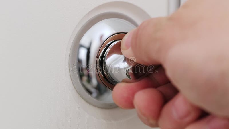 Close-up of Doorknob. Hand Closing Door or Locking Handle. Stock Video ...