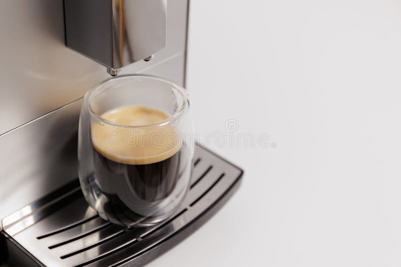 Close Up of Double Wall Glass of Espresso on Coffee Machine and Copy ...