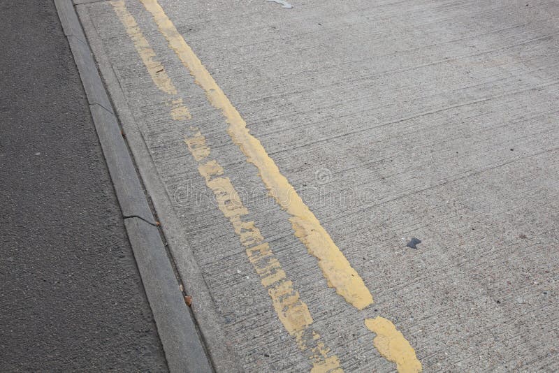 Close-Up of Double Yellow Line on Road Stock Photo - Image of ...