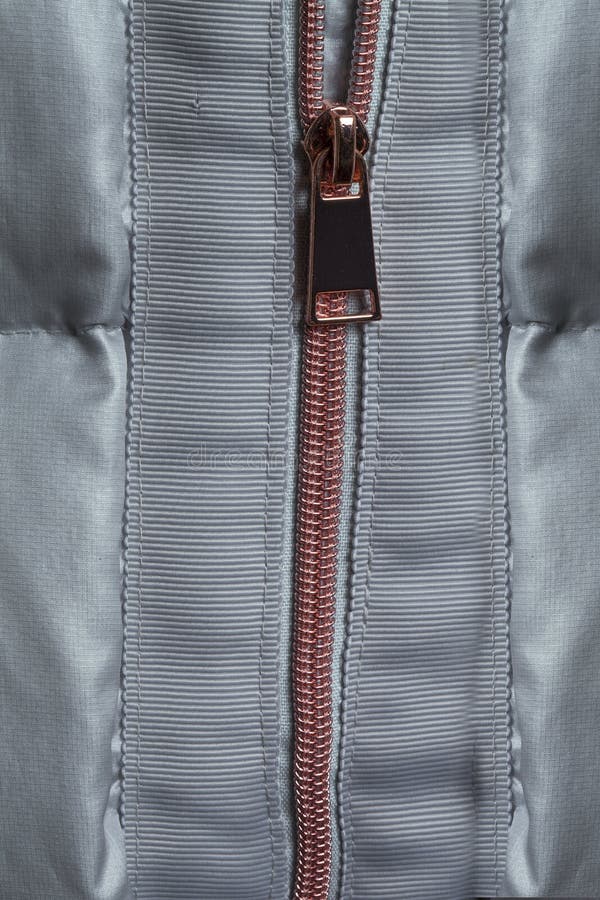 Close-up of a Down Jacket and Zipper. Silver Down Jacket Stock Photo ...