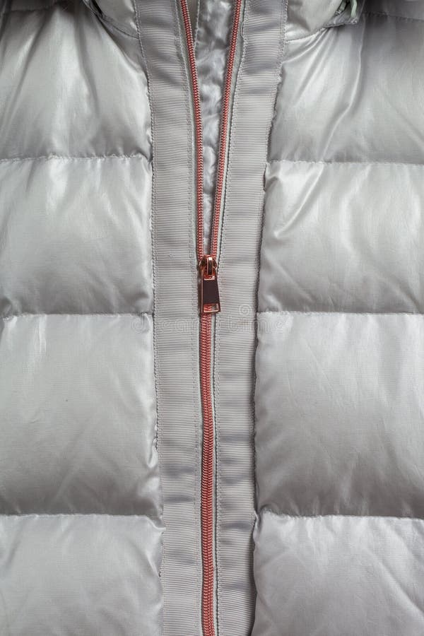 Close-up of a Down Jacket and Zipper. Silver Down Jacket Stock Photo ...