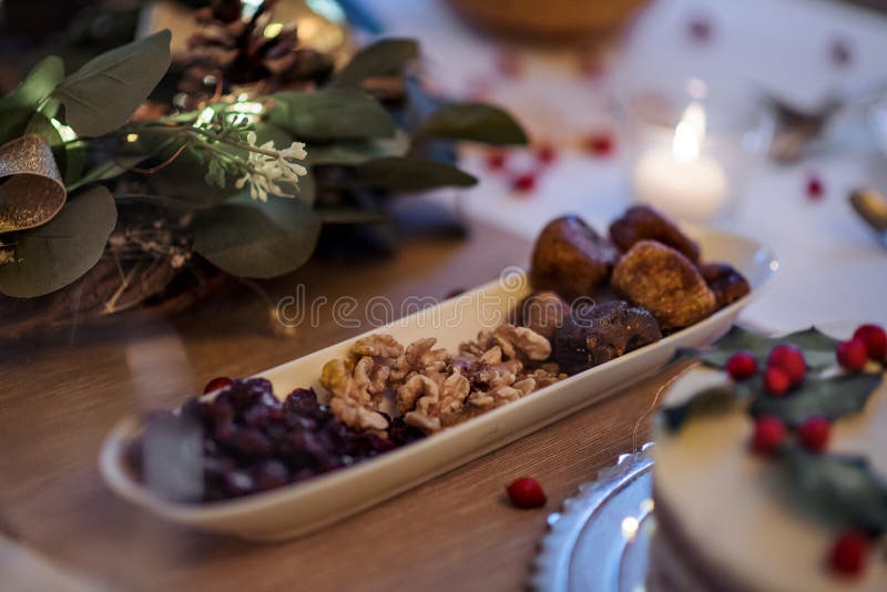 A Close-up of Dried Fruit and Nuts on Table Set for Dinner Meal at ...