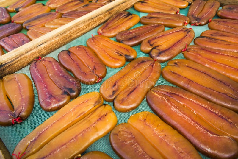 Dried Mullet Roe on the Table. Stock Photo - Image of gold, fisheries ...
