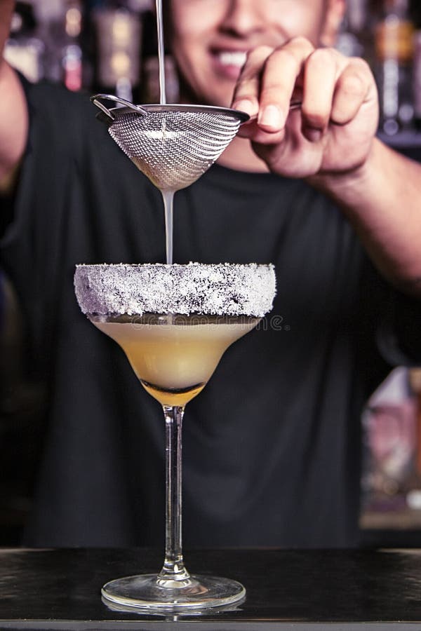 Close-up of a Drink Being Strained To Prepare a Cocktail Stock Image ...