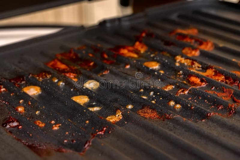 Close Up of Dripping-pan of Dried Up Fat on it Stock Photo - Image of ...