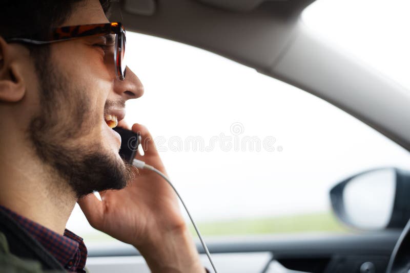 Close-up of Driver Face Talking by Smartphone. Stock Image - Image of ...